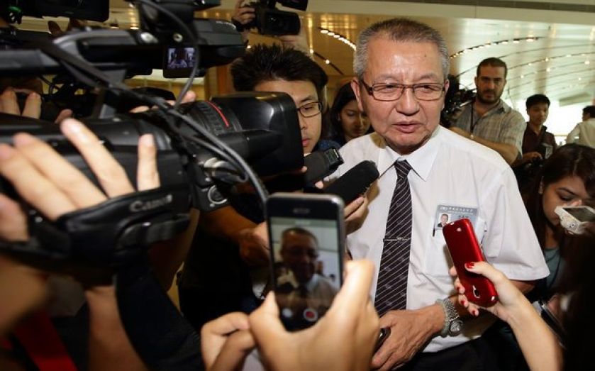 Briton on missing AirAsia flight QZ8501 identified as Chi-Man Choi