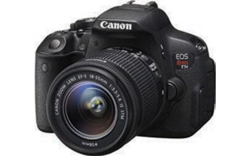 Canon sales fall as phones snap up its market