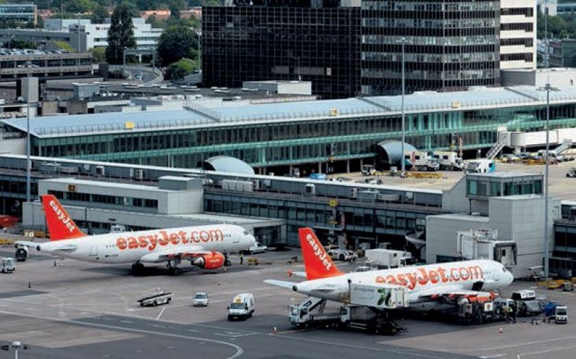EasyJet cruises above turbulence but shares tumble five per cent