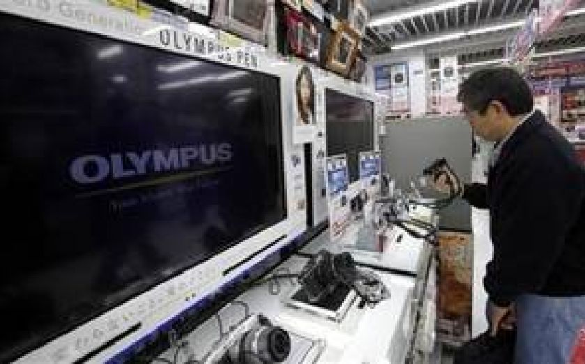 Former Olympus executives arrested in fraud swoop