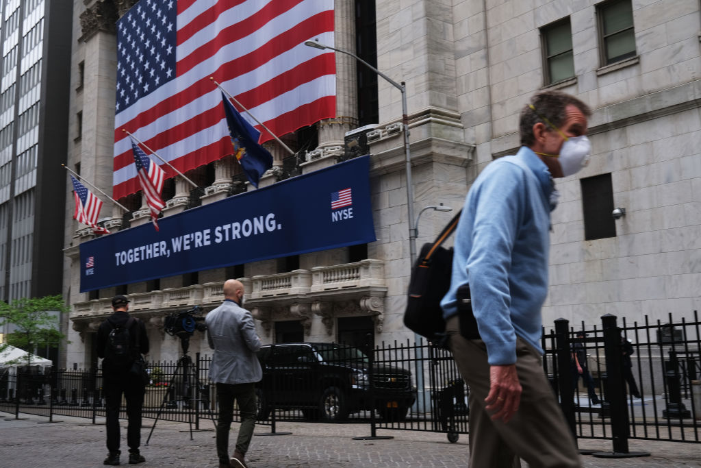 Traders return to NYSE floor after two months