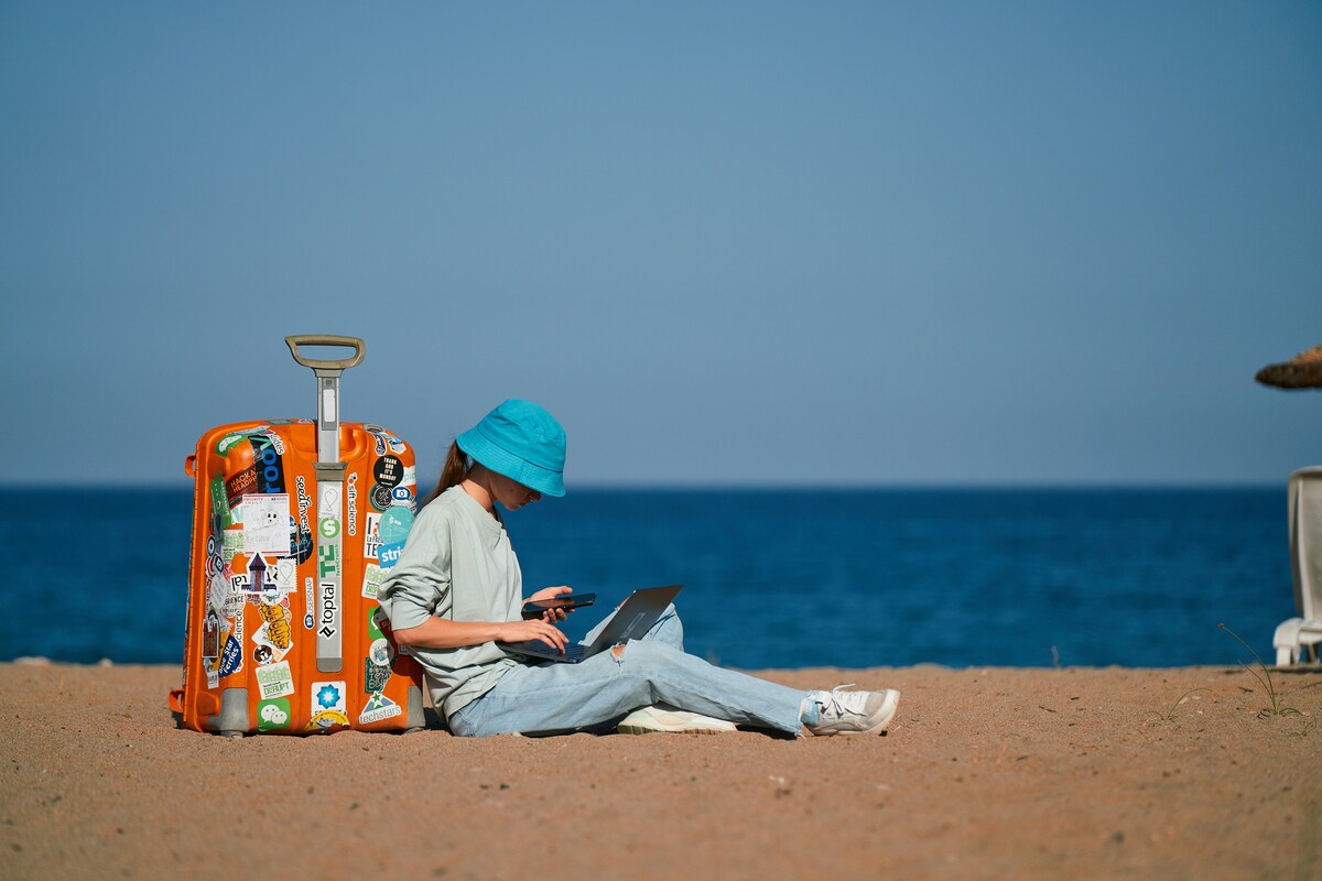 Sun, sea and Slack: As many Brits plan to work from abroad - what are ...